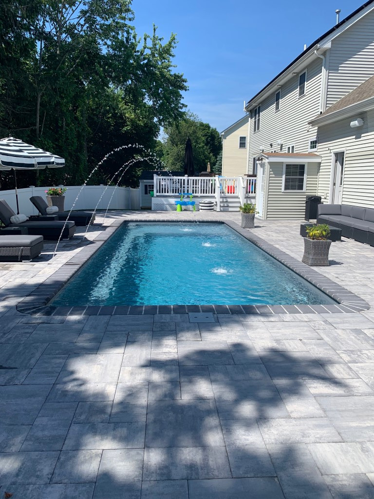 The Reflection with Splash Deck - Ohio Custom Pool & Patio is a full ...